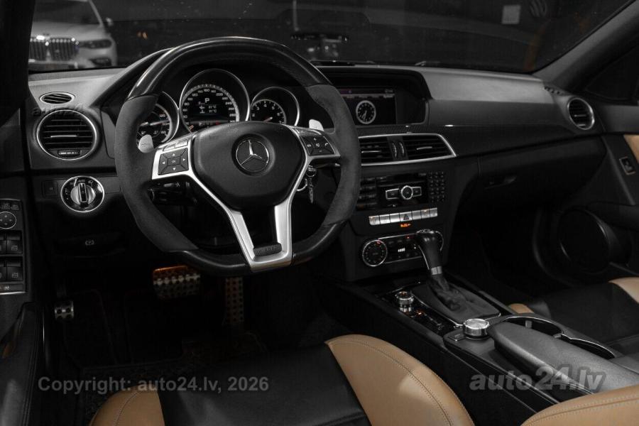 Black Mercedes-Benz C-Class 2013 in Riga, with an engine capacity of 6.20 L and mileage of 182 thousand km for 32000 €, photo 12 on AUTOMOTO.COM.LV