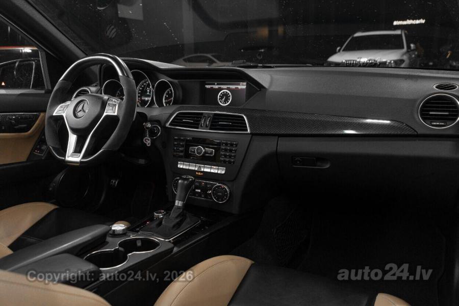 Black Mercedes-Benz C-Class 2013 in Riga, with an engine capacity of 6.20 L and mileage of 182 thousand km for 32000 €, photo 14 on AUTOMOTO.COM.LV