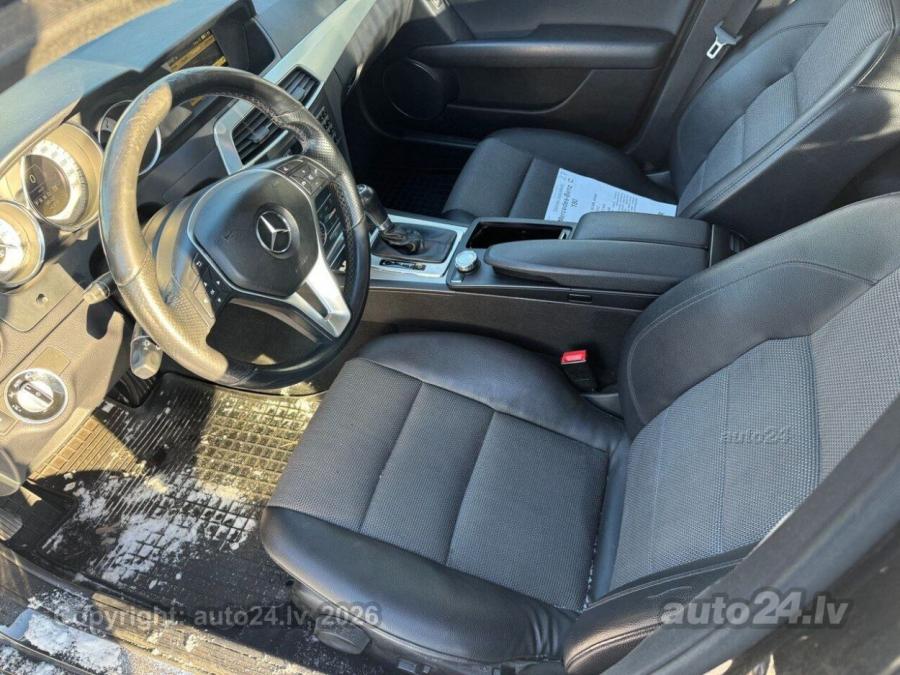 Black Mercedes-Benz C-Class 2013 in Tallinn, with an engine capacity of 2.10 L and mileage of 326 thousand km for 6750 €, photo 8 on AUTOMOTO.COM.LV