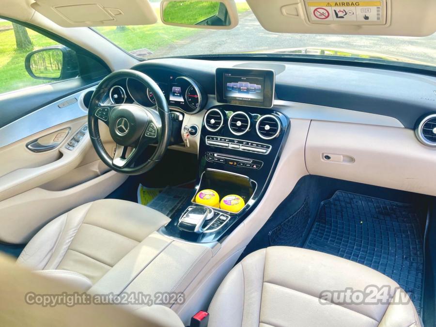 Black Mercedes-Benz C-Class 2014 in Tallinn, with an engine capacity of 2.10 L and mileage of 184 thousand km for 14300 €, photo 11 on AUTOMOTO.COM.LV