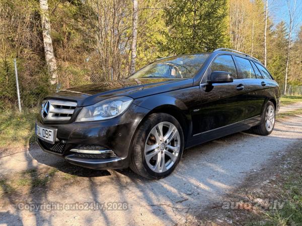 Black Mercedes-Benz C-Class 2011 in Tallinn, with an engine capacity of 2.10 L and mileage of 283 thousand km for 7999 €, photo 1 on AUTOMOTO.COM.LV