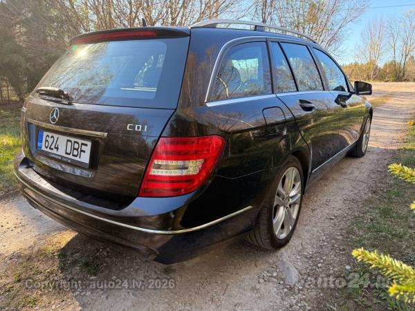 Black Mercedes-Benz C-Class 2011 in Tallinn, with an engine capacity of 2.10 L and mileage of 283 thousand km for 7999 €, photo 4 on AUTOMOTO.COM.LV