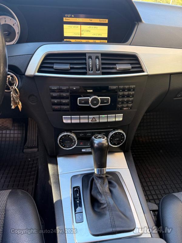 Black Mercedes-Benz C-Class 2011 in Tallinn, with an engine capacity of 2.10 L and mileage of 283 thousand km for 7999 €, photo 10 on AUTOMOTO.COM.LV