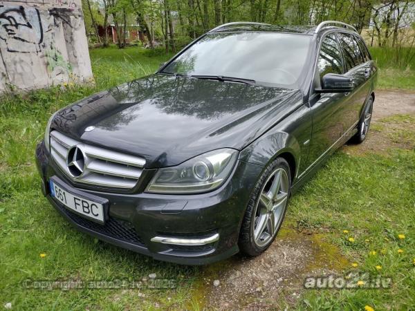 Black Mercedes-Benz C-Class 2012 in Tallinn, with an engine capacity of 3.00 L and mileage of 332 thousand km for 15999 €, photo 2 on AUTOMOTO.COM.LV