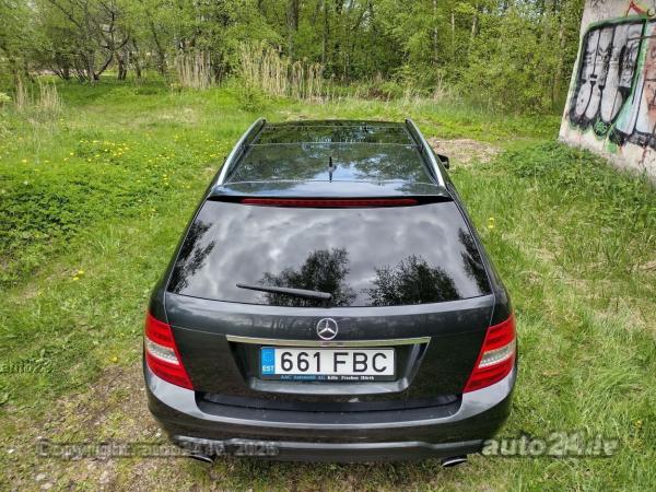 Black Mercedes-Benz C-Class 2012 in Tallinn, with an engine capacity of 3.00 L and mileage of 332 thousand km for 15999 €, photo 5 on AUTOMOTO.COM.LV