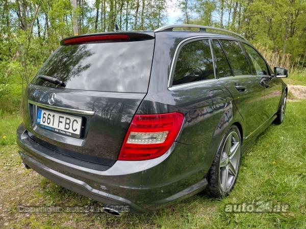Black Mercedes-Benz C-Class 2012 in Tallinn, with an engine capacity of 3.00 L and mileage of 332 thousand km for 15999 €, photo 6 on AUTOMOTO.COM.LV