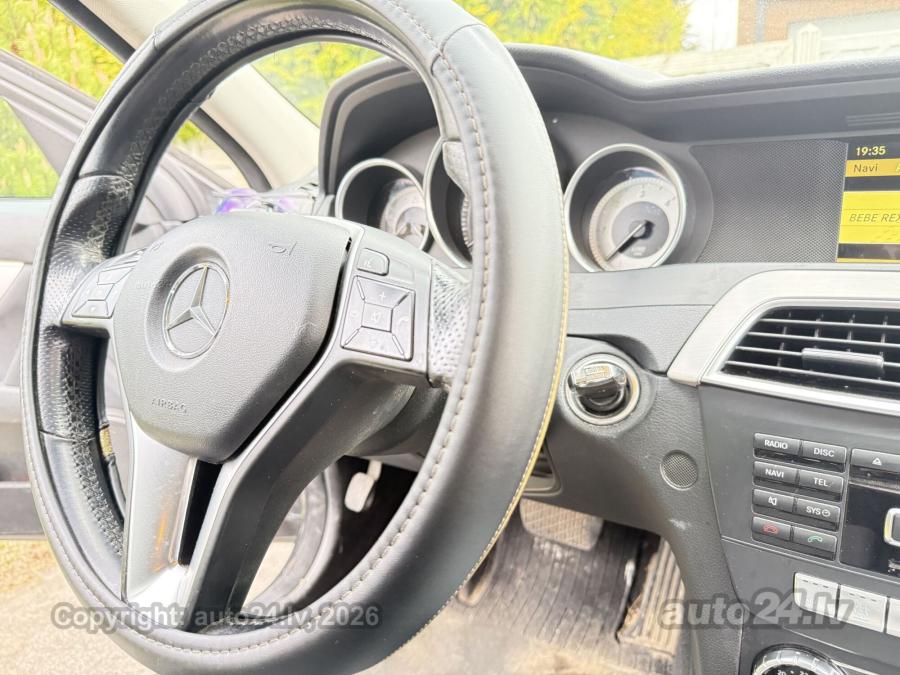 Black Mercedes-Benz C-Class 2012 in Tallinn, with an engine capacity of 2.10 L and mileage of 460 thousand km for 5900 €, photo 4 on AUTOMOTO.COM.LV