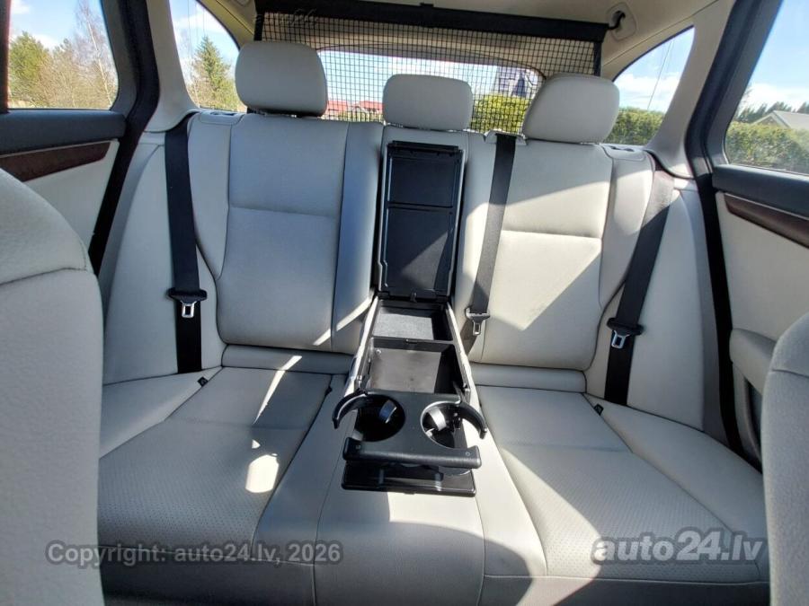 Black Mercedes-Benz C-Class 2013 in Tallinn, with an engine capacity of 2.10 L and mileage of 190 thousand km for 7000 €, photo 14 on AUTOMOTO.COM.LV