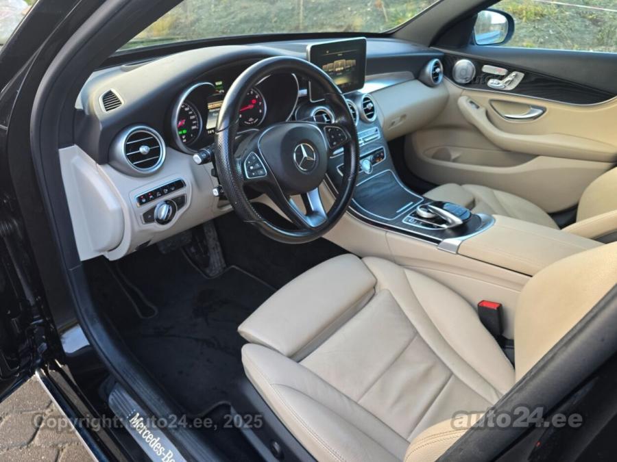 Black Mercedes-Benz C-Class 2015 in Tallinn, with an engine capacity of 2.00 L and mileage of 190 thousand km for 12990 €, photo 8 on AUTOMOTO.COM.LV