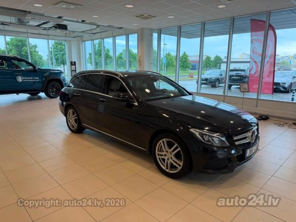 Black Mercedes-Benz C-Class 2015 in Tallinn, with an engine capacity of 2.00 L and mileage of 194 thousand km for 10999 €, photo 2 on AUTOMOTO.COM.LV