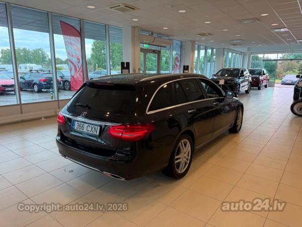 Black Mercedes-Benz C-Class 2015 in Tallinn, with an engine capacity of 2.00 L and mileage of 194 thousand km for 10999 €, photo 3 on AUTOMOTO.COM.LV
