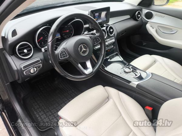 Black Mercedes-Benz C-Class 2016 in Tallinn, with an engine capacity of 2.10 L and mileage of 293 thousand km for 9989 €, photo 7 on AUTOMOTO.COM.LV