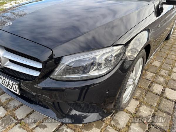 Black Mercedes-Benz C-Class 2019 in Tallinn, with an engine capacity of 8.10 L and mileage of 99 thousand km for 21265 €, photo 5 on AUTOMOTO.COM.LV