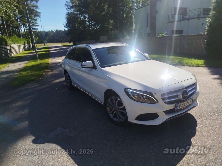 White Mercedes-Benz C-Class 2015 in Tallinn, with an engine capacity of 2.00 L and mileage of 165 thousand km for 10900 €, photo 4 on AUTOMOTO.COM.LV