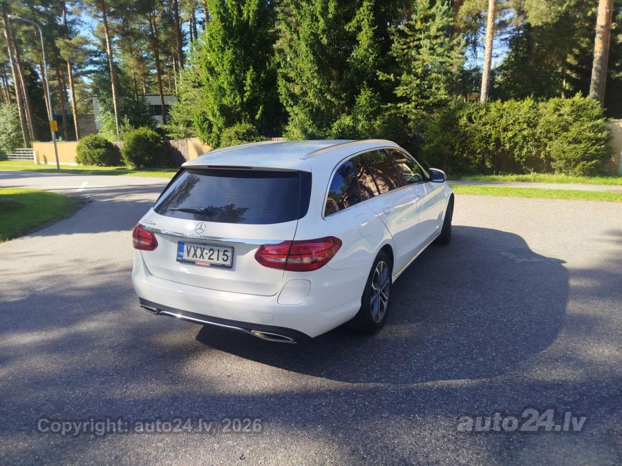 White Mercedes-Benz C-Class 2015 in Tallinn, with an engine capacity of 2.00 L and mileage of 165 thousand km for 10900 €, photo 5 on AUTOMOTO.COM.LV