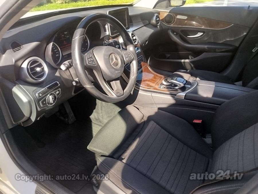 White Mercedes-Benz C-Class 2015 in Tallinn, with an engine capacity of 2.00 L and mileage of 165 thousand km for 10900 €, photo 7 on AUTOMOTO.COM.LV
