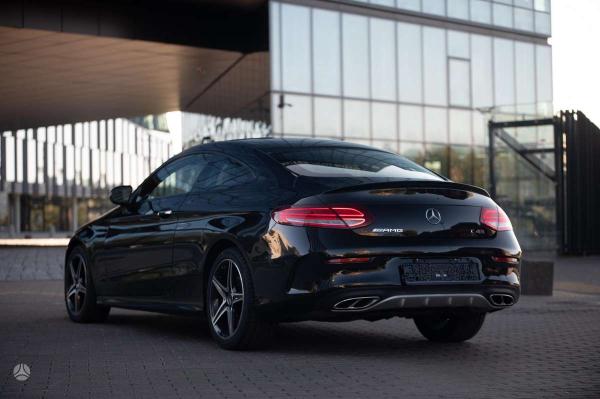 Black Mercedes-Benz C43 AMG 2017 in Vilnius, with an engine capacity of 3.00 L and mileage of 60 thousand km for 27800 €, photo 6 on AUTOMOTO.COM.LV