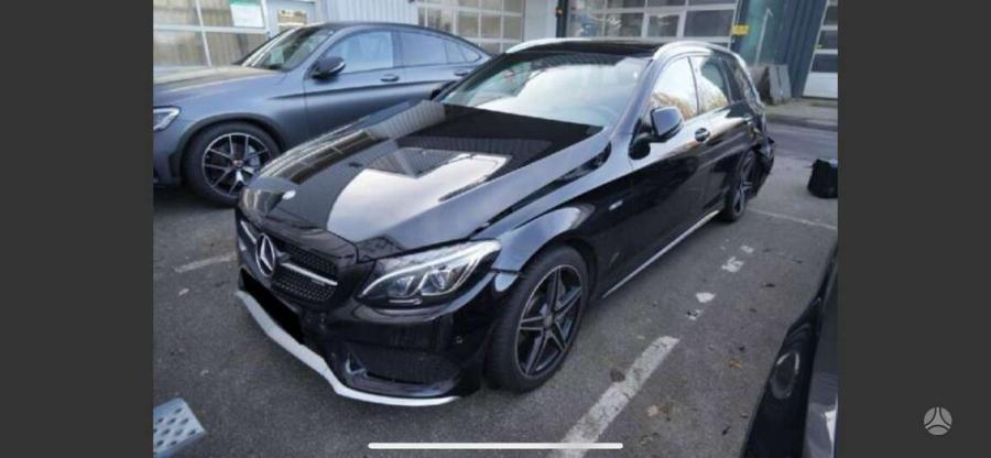 Black Mercedes-Benz C43 AMG 2016 in Siauliai, with an engine capacity of 3.00 L and mileage of 196 thousand km for 11200 €, photo 1 on AUTOMOTO.COM.LV