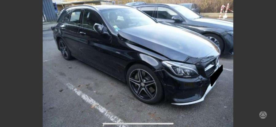 Black Mercedes-Benz C43 AMG 2016 in Siauliai, with an engine capacity of 3.00 L and mileage of 196 thousand km for 11200 €, photo 2 on AUTOMOTO.COM.LV