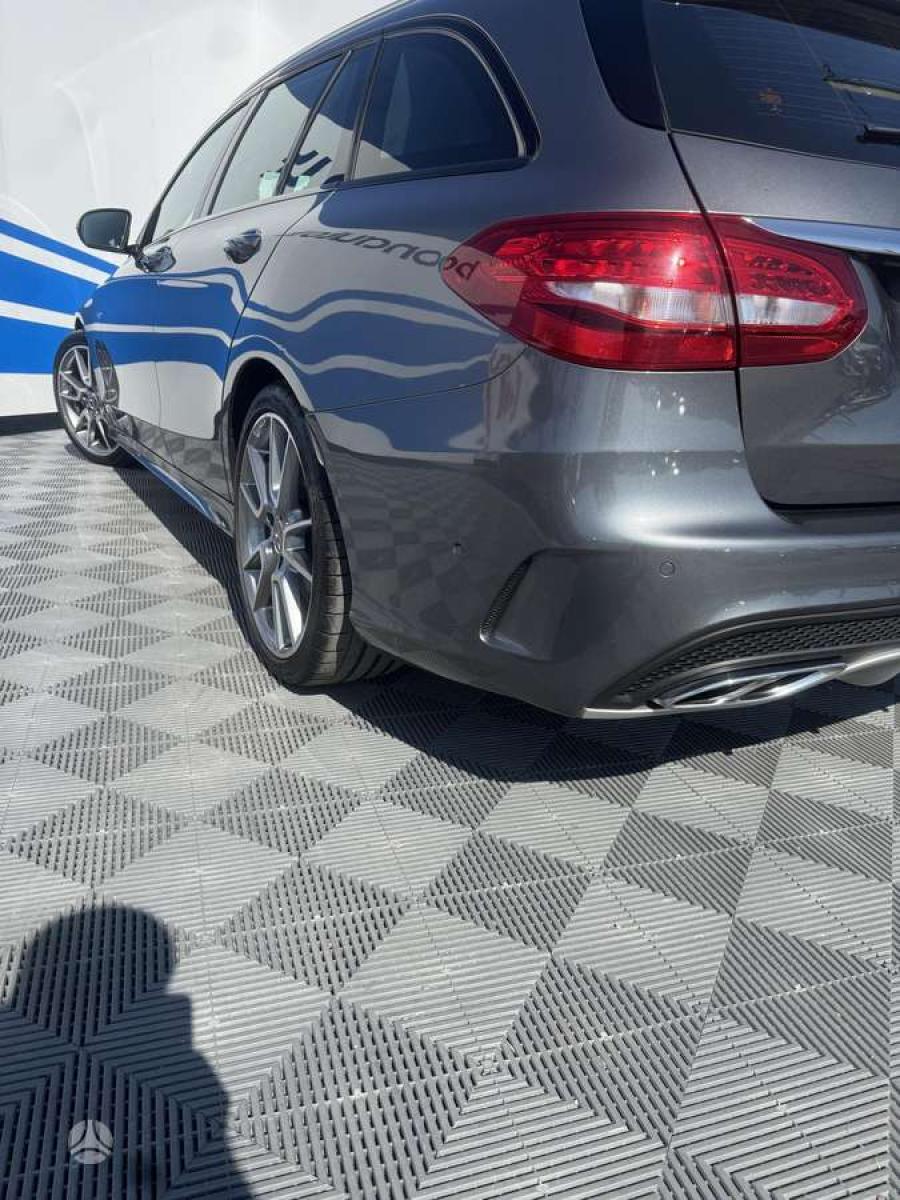 Grey Mercedes-Benz C43 AMG 2017 in Kaunas, with an engine capacity of 3.00 L and mileage of 200 thousand km for 21850 €, photo 8 on AUTOMOTO.COM.LV