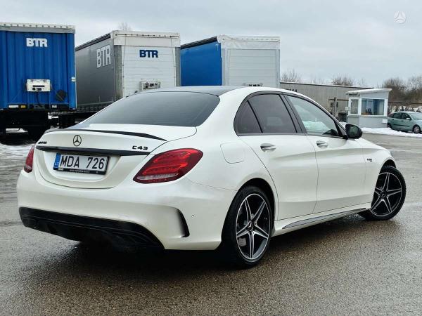 White Mercedes-Benz C43 AMG 2017 in Vilnius, with an engine capacity of 3.00 L and mileage of 151 thousand km for 23900 €, photo 4 on AUTOMOTO.COM.LV