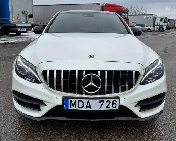 White Mercedes-Benz C43 AMG 2017 in Vilnius, with an engine capacity of 3.00 L and mileage of 151 thousand km for 23900 €, photo 5 on AUTOMOTO.COM.LV