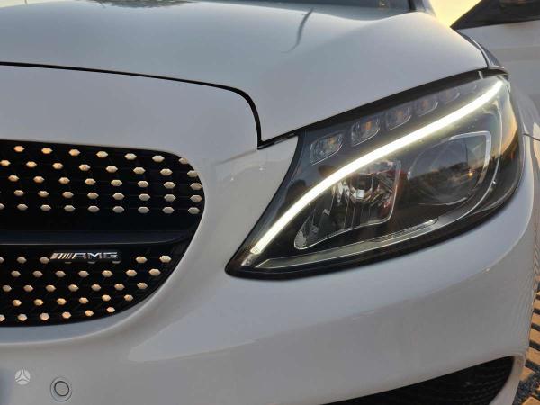 White Mercedes-Benz C43 AMG 2017 in Kaunas, with an engine capacity of 3.00 L and mileage of 147 thousand km for 22990 €, photo 9 on AUTOMOTO.COM.LV
