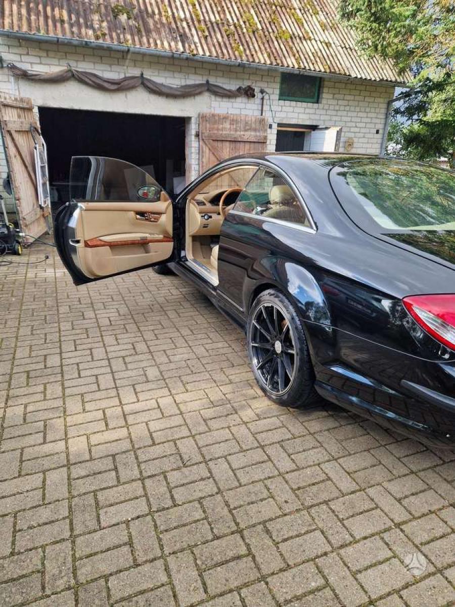 Black Mercedes-Benz cl-500 2008 in Klaipeda, with an engine capacity of 5.50 L and mileage of 168 thousand km for 10640 €, photo 14 on AUTOMOTO.COM.LV