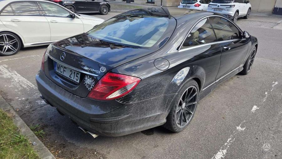 Black Mercedes-Benz cl-500 2008 in Klaipeda, with an engine capacity of 5.50 L and mileage of 168 thousand km for 10640 €, photo 25 on AUTOMOTO.COM.LV