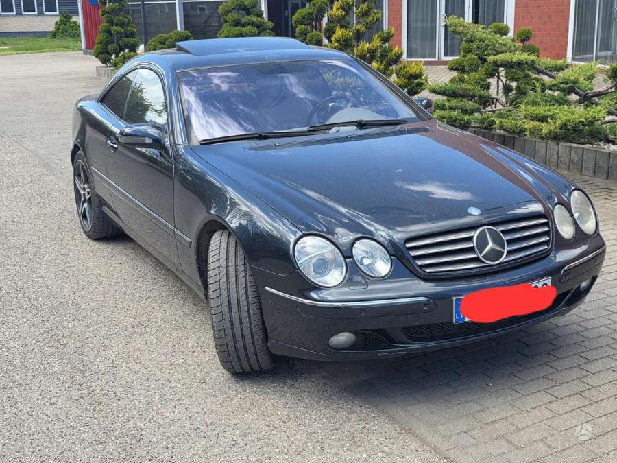 Violet Mercedes-Benz cl-500 2002 in Marijampole, with an engine capacity of 5.00 L and mileage of 251 thousand km for 9999 €, photo 3 on AUTOMOTO.COM.LV