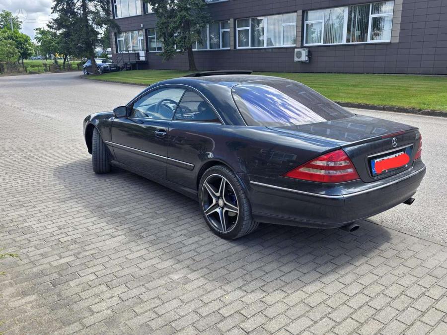 Violet Mercedes-Benz cl-500 2002 in Marijampole, with an engine capacity of 5.00 L and mileage of 251 thousand km for 9999 €, photo 4 on AUTOMOTO.COM.LV