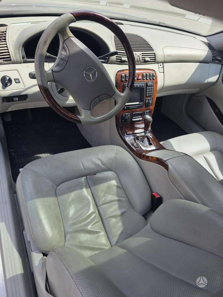 Violet Mercedes-Benz cl-500 2002 in Marijampole, with an engine capacity of 5.00 L and mileage of 251 thousand km for 9999 €, photo 6 on AUTOMOTO.COM.LV