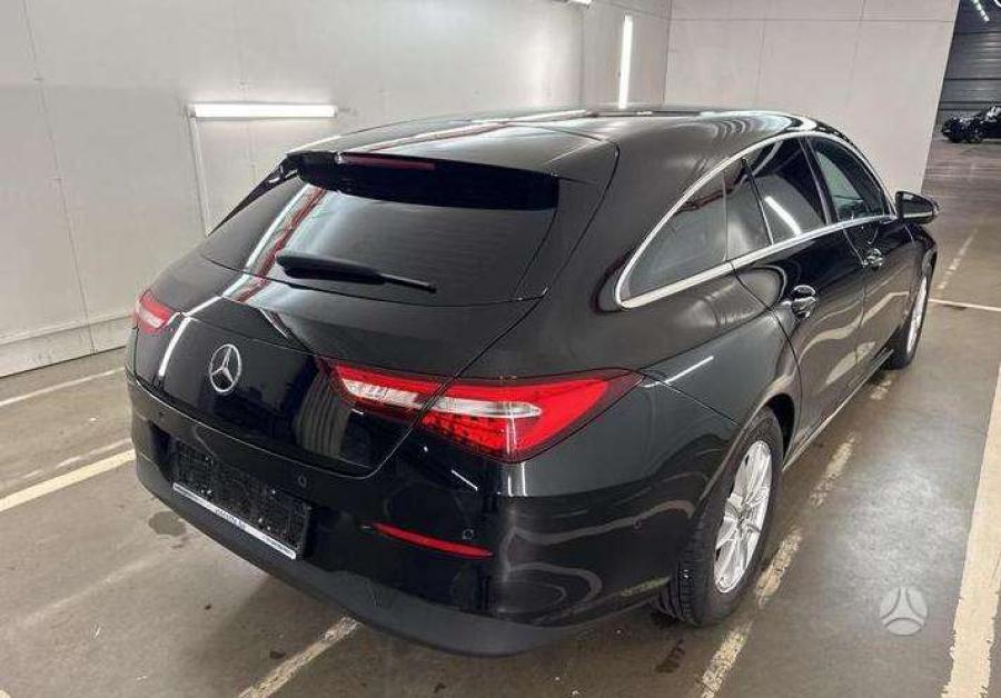 Black Mercedes-Benz CLA 180 2022 in Siauliai, with an engine capacity of 2.00 L and mileage of 200 thousand km for 19499 €, photo 4 on AUTOMOTO.COM.LV