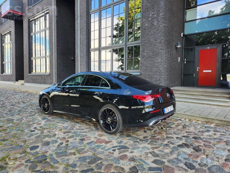 Black Mercedes-Benz CLA 200 2021 in Riga, with an engine capacity of 1.40 L and mileage of 50 thousand km for 31450 €, photo 4 on AUTOMOTO.COM.LV