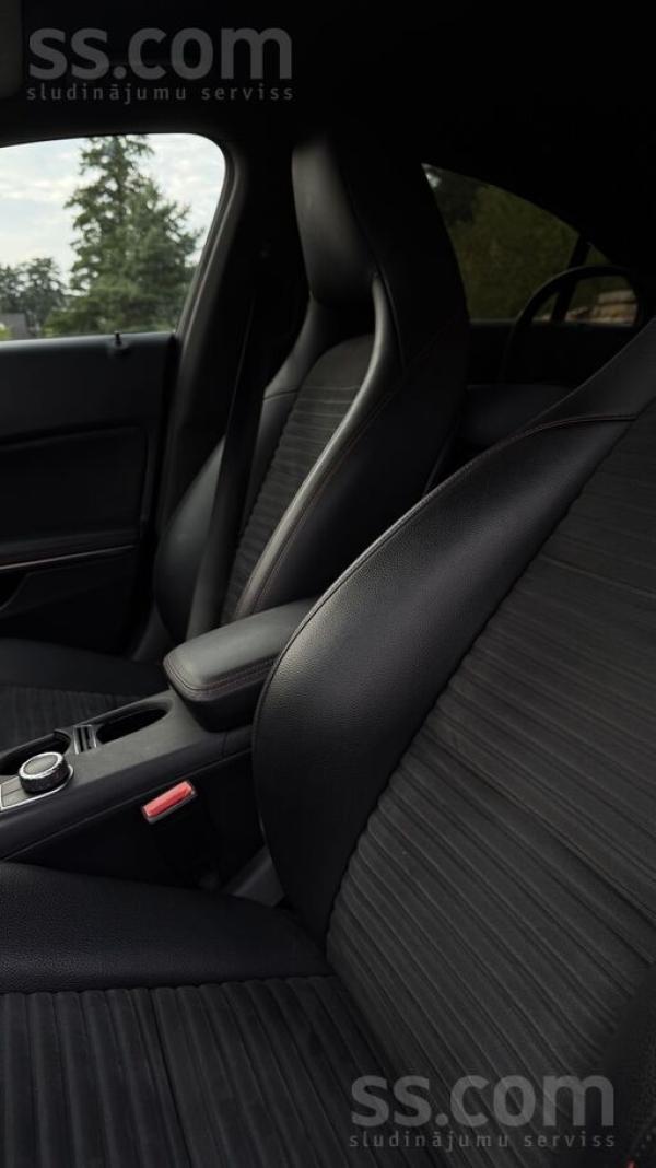 Black Mercedes-Benz CLA 200 2013 in Riga, with an engine capacity of 1.60 L and mileage of 220 thousand km for 11900 €, photo 6 on AUTOMOTO.COM.LV
