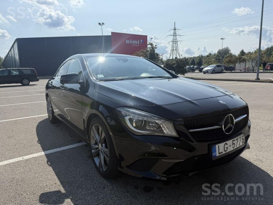 Black Mercedes-Benz CLA 200 2013 in Riga, with an engine capacity of 1.60 L and mileage of 184 thousand km for 14200 €, photo 1 on AUTOMOTO.COM.LV