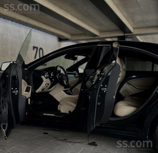 Black Mercedes-Benz CLA 200 2013 in Riga, with an engine capacity of 1.60 L and mileage of 184 thousand km for 14200 €, photo 7 on AUTOMOTO.COM.LV