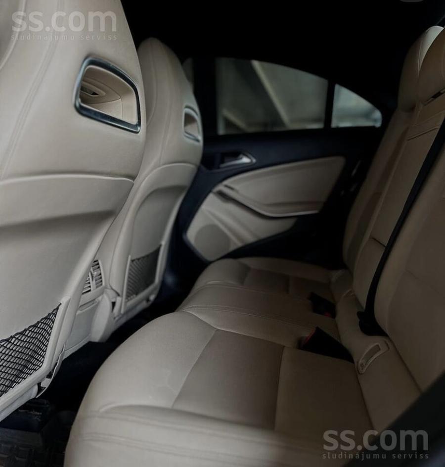 Black Mercedes-Benz CLA 200 2013 in Riga, with an engine capacity of 1.60 L and mileage of 184 thousand km for 14200 €, photo 8 on AUTOMOTO.COM.LV