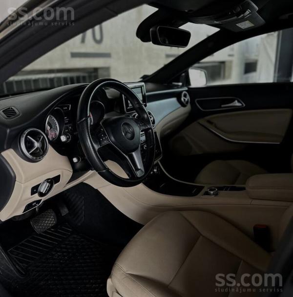 Black Mercedes-Benz CLA 200 2013 in Riga, with an engine capacity of 1.60 L and mileage of 184 thousand km for 14200 €, photo 10 on AUTOMOTO.COM.LV