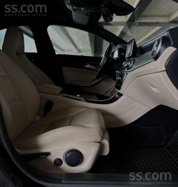Black Mercedes-Benz CLA 200 2013 in Riga, with an engine capacity of 1.60 L and mileage of 184 thousand km for 14200 €, photo 11 on AUTOMOTO.COM.LV