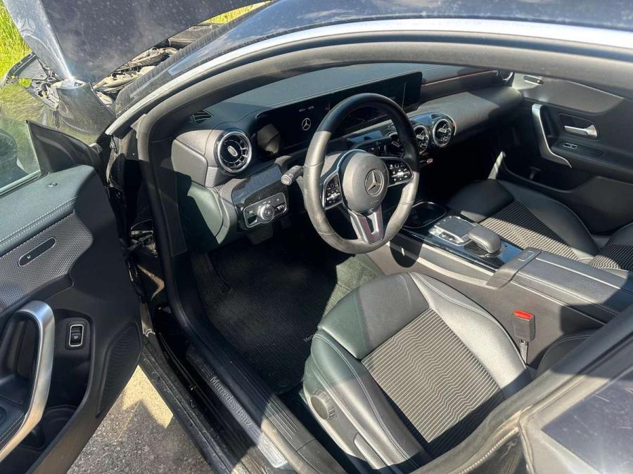 Black Mercedes-Benz CLA 200 2019 in Kaunas, with an engine capacity of 2.00 L and mileage of 142 thousand km for 12900 €, photo 8 on AUTOMOTO.COM.LV