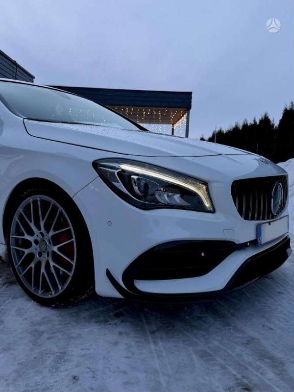 White Mercedes-Benz CLA 45 AMG 2019 in Kaunas, with an engine capacity of 2.00 L and mileage of 121 thousand km for 26800 €, photo 4 on AUTOMOTO.COM.LV