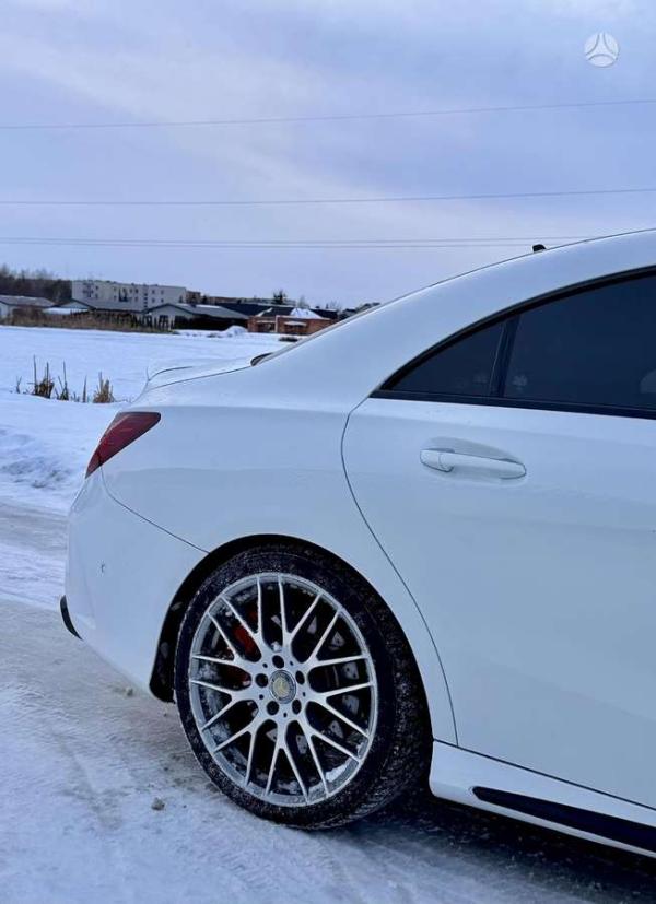 White Mercedes-Benz CLA 45 AMG 2019 in Kaunas, with an engine capacity of 2.00 L and mileage of 121 thousand km for 26800 €, photo 7 on AUTOMOTO.COM.LV