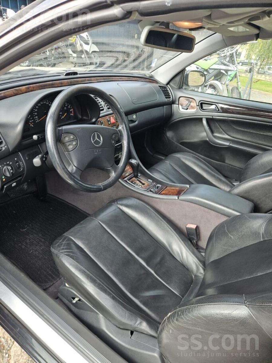 Black Mercedes-Benz clk-230 2000 in Cesis, with an engine capacity of 2.30 L and mileage of 209 thousand km for 3300 €, photo 11 on AUTOMOTO.COM.LV