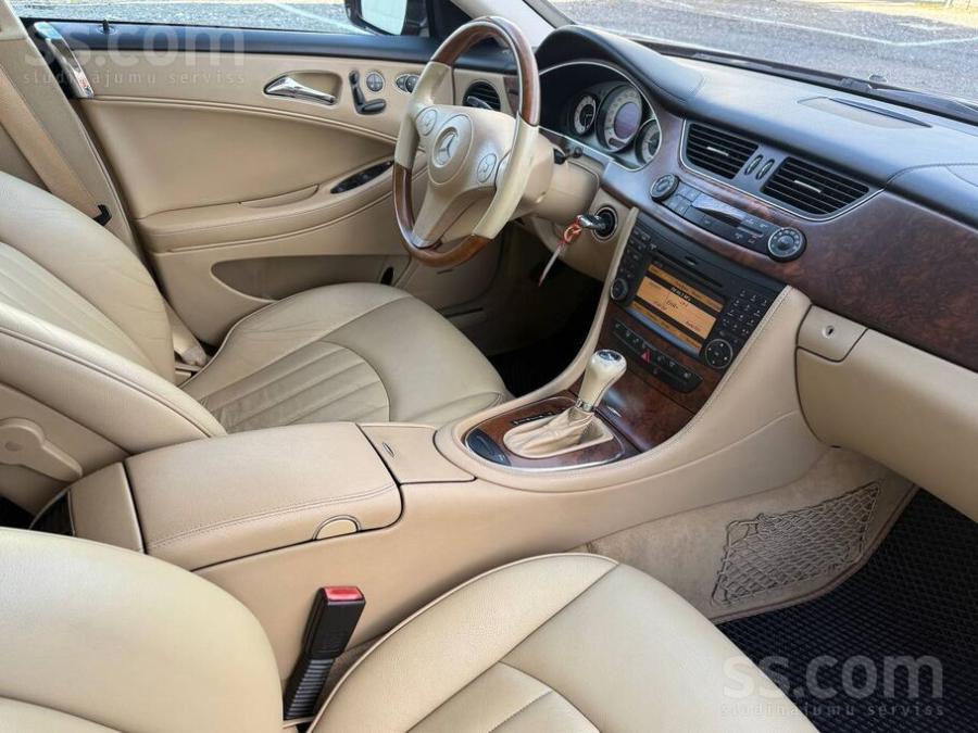 Red Mercedes-Benz CLS 320 2009 in Riga, with an engine capacity of 3.00 L and mileage of 327 thousand km for 7900 €, photo 9 on AUTOMOTO.COM.LV
