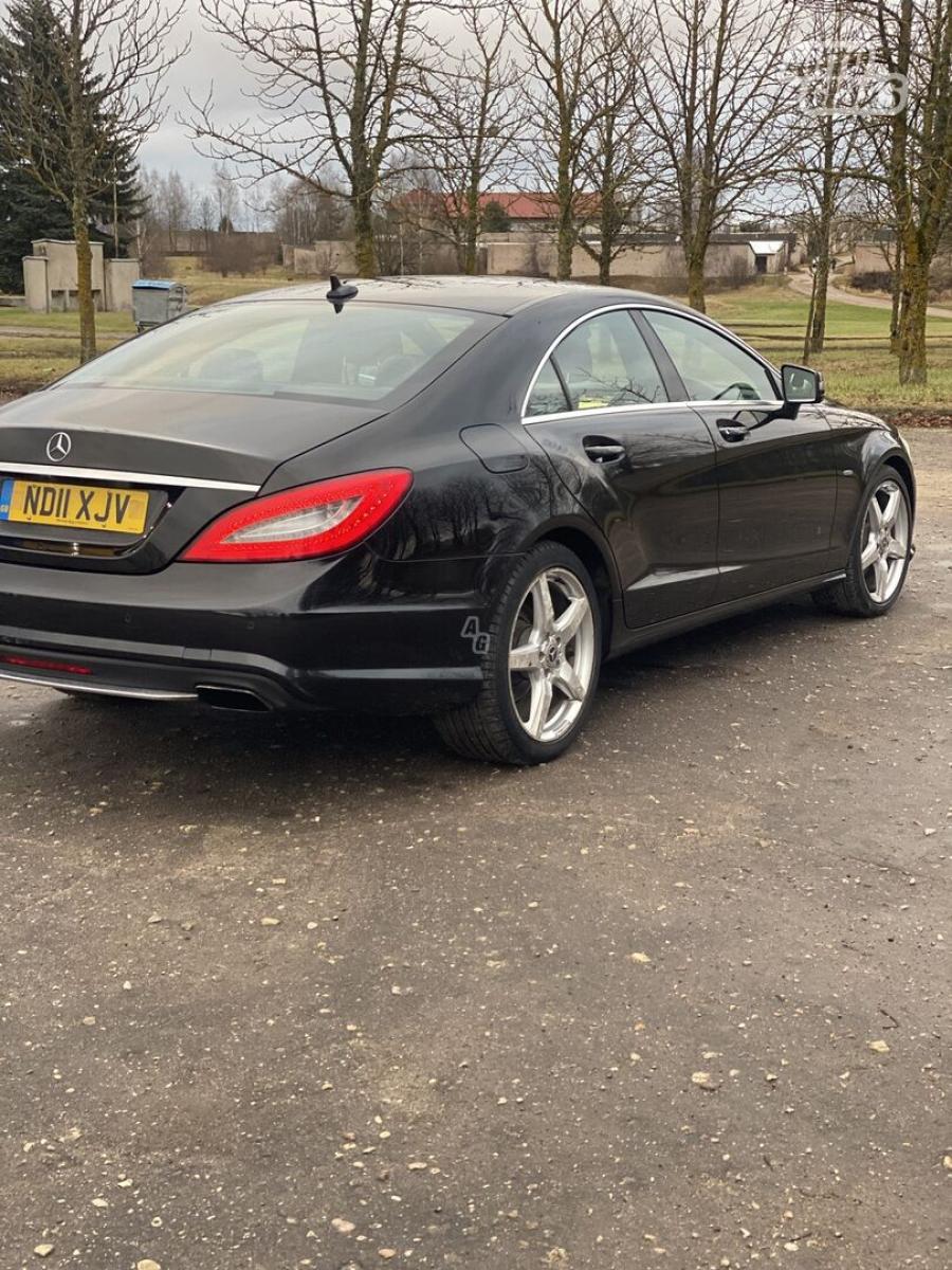 Black Mercedes-Benz CLS 350 2011 in Kupiskis, with an engine capacity of 3.00 L and mileage of 149 thousand km for 6950 €, photo 7 on AUTOMOTO.COM.LV