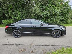 Black Mercedes-Benz CLS 350 2012 in Prienai, with an engine capacity of 2.99 L and mileage of 299 thousand km for 11700 €, photo 6 on AUTOMOTO.COM.LV