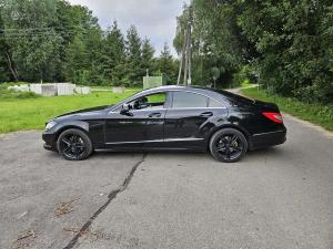 Black Mercedes-Benz CLS 350 2012 in Prienai, with an engine capacity of 2.99 L and mileage of 299 thousand km for 11700 €, photo 18 on AUTOMOTO.COM.LV