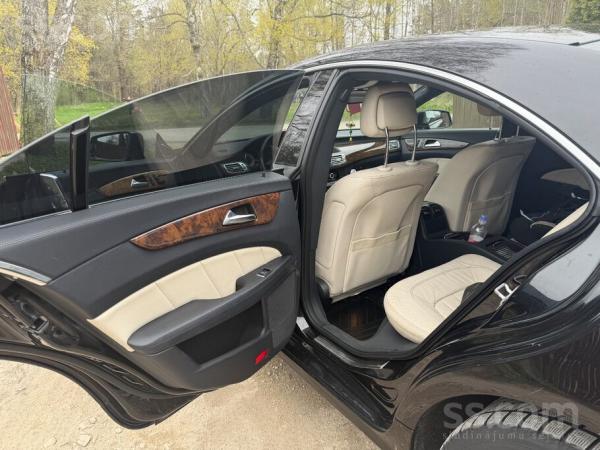 Black Mercedes-Benz CLS 350 2011 in Riga, with an engine capacity of 3.50 L and mileage of 263 thousand km for 13000 €, photo 7 on AUTOMOTO.COM.LV