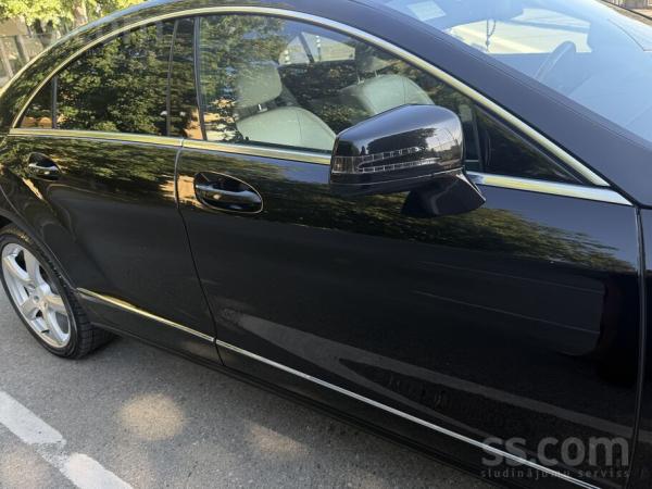 Black Mercedes-Benz CLS 350 2011 in Riga, with an engine capacity of 3.00 L and mileage of 263 thousand km for 12100 €, photo 3 on AUTOMOTO.COM.LV